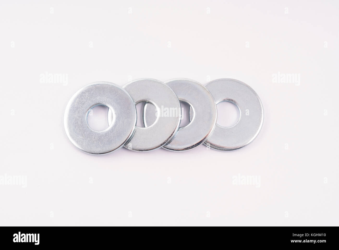 Metallic o-rings on a white background Stock Photo - Alamy