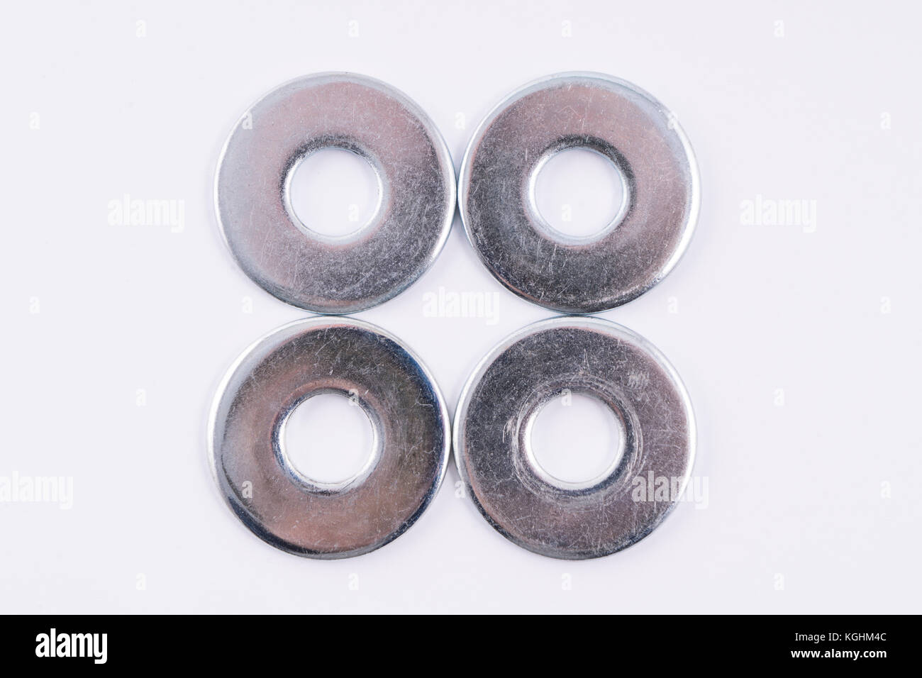 Metallic o-rings on a white background Stock Photo - Alamy