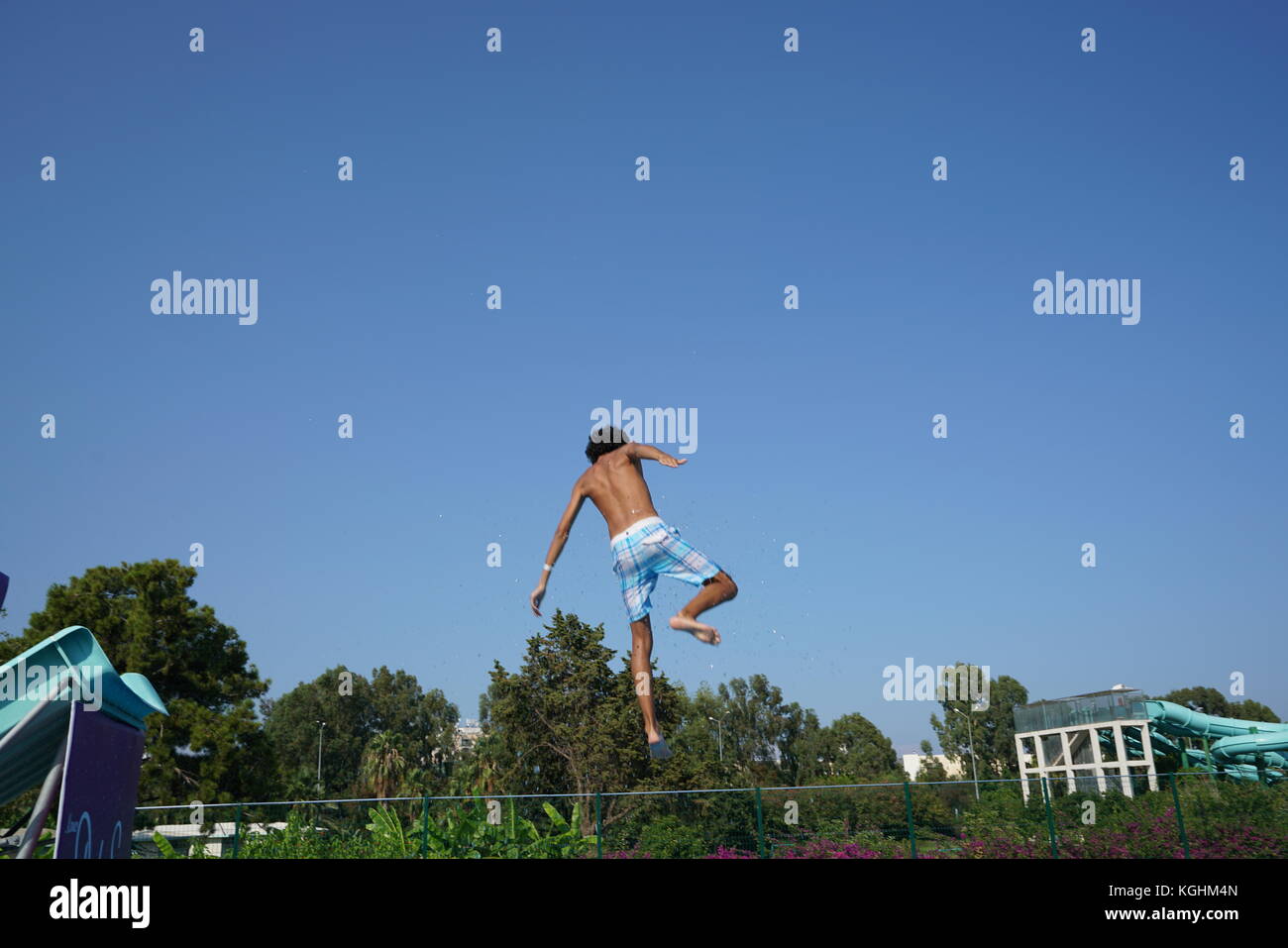 High diving: jumping in the air and flying in swimsuit Stock Photo - Alamy