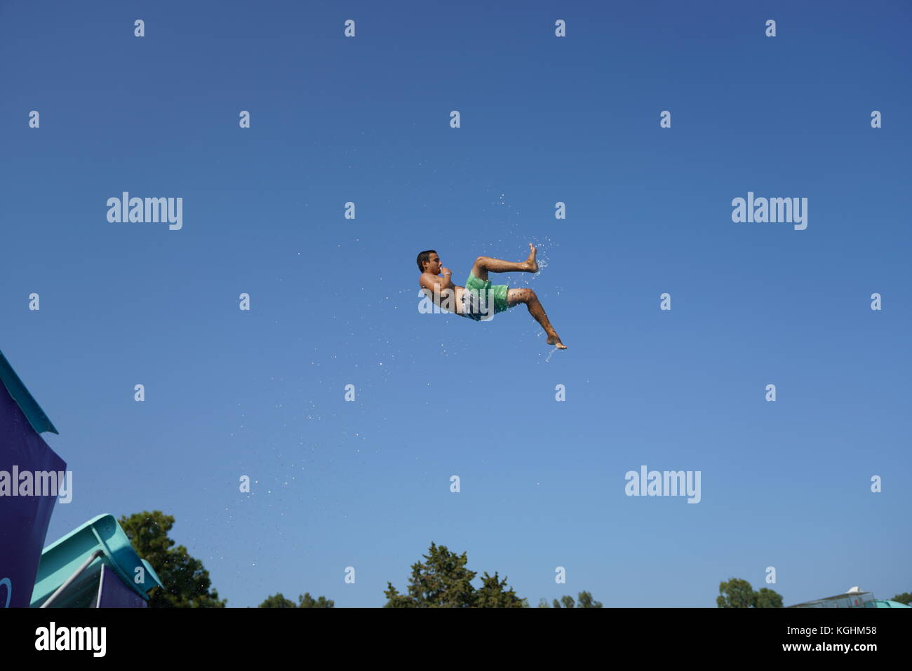 High diving: jumping in the air and flying in swimsuit Stock Photo - Alamy