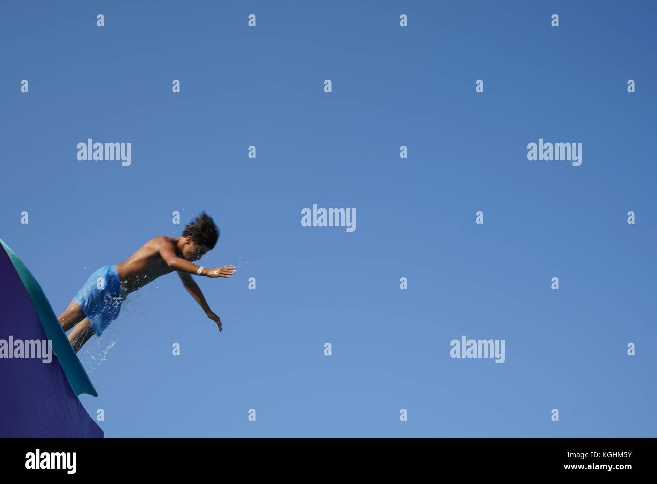 High diving: jumping in the air and flying in swimsuit Stock Photo - Alamy