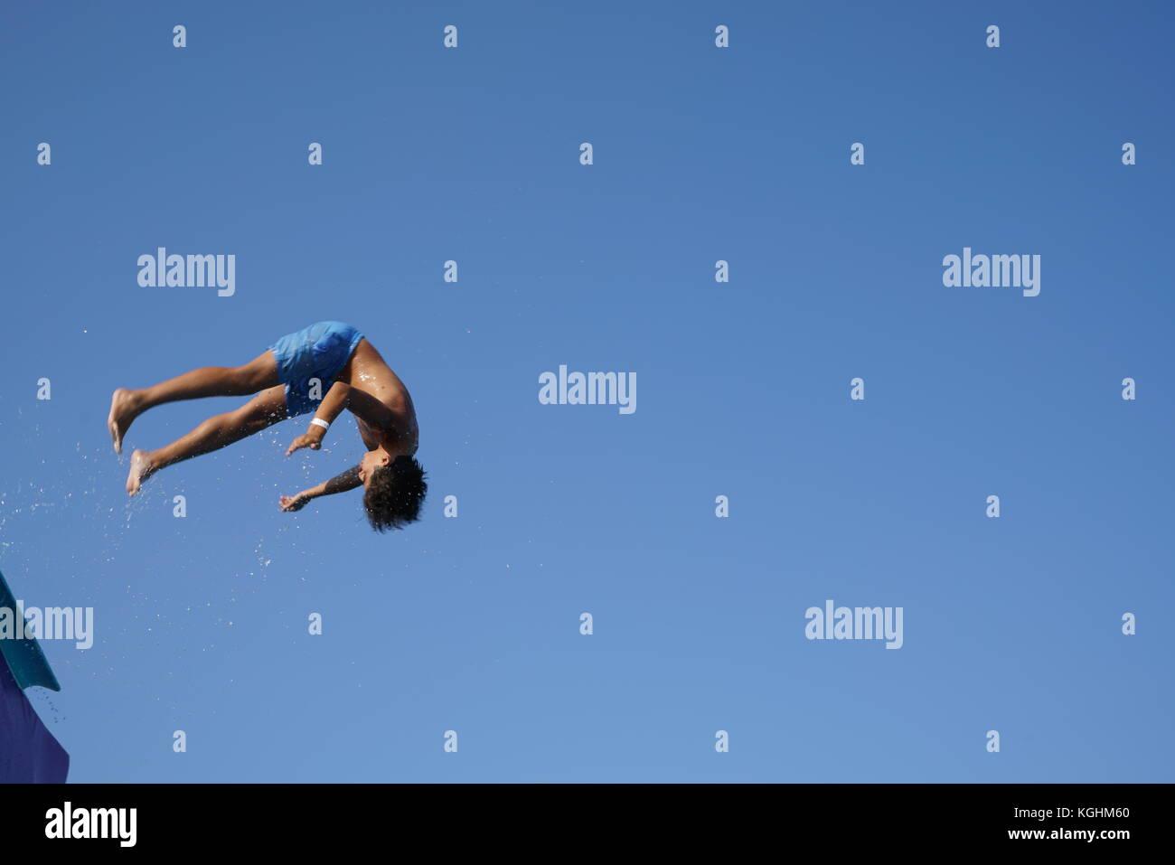 High diving: jumping in the air and flying in swimsuit Stock Photo - Alamy