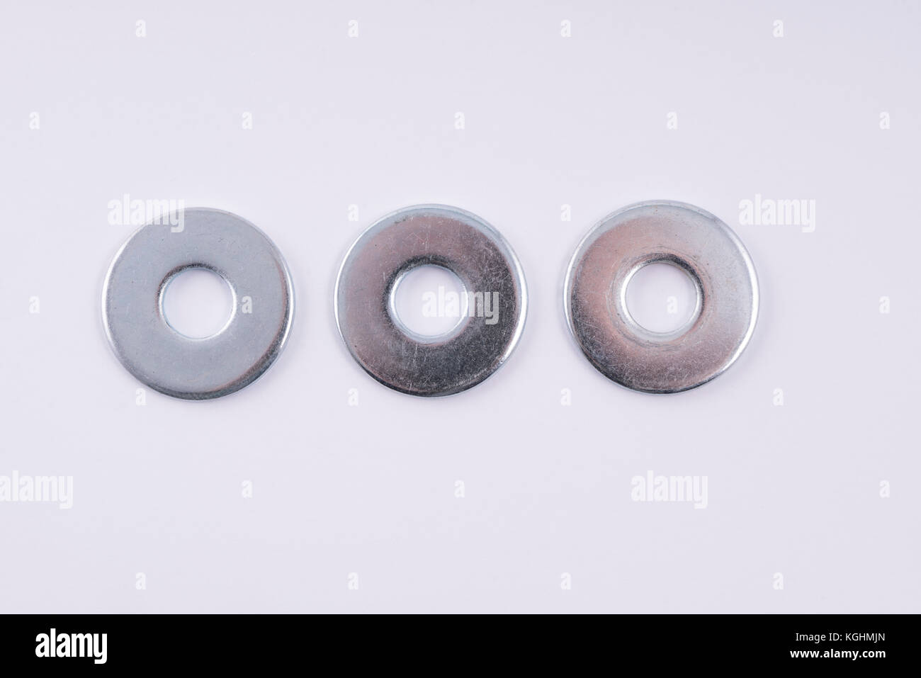 Metallic o-rings on a white background Stock Photo - Alamy