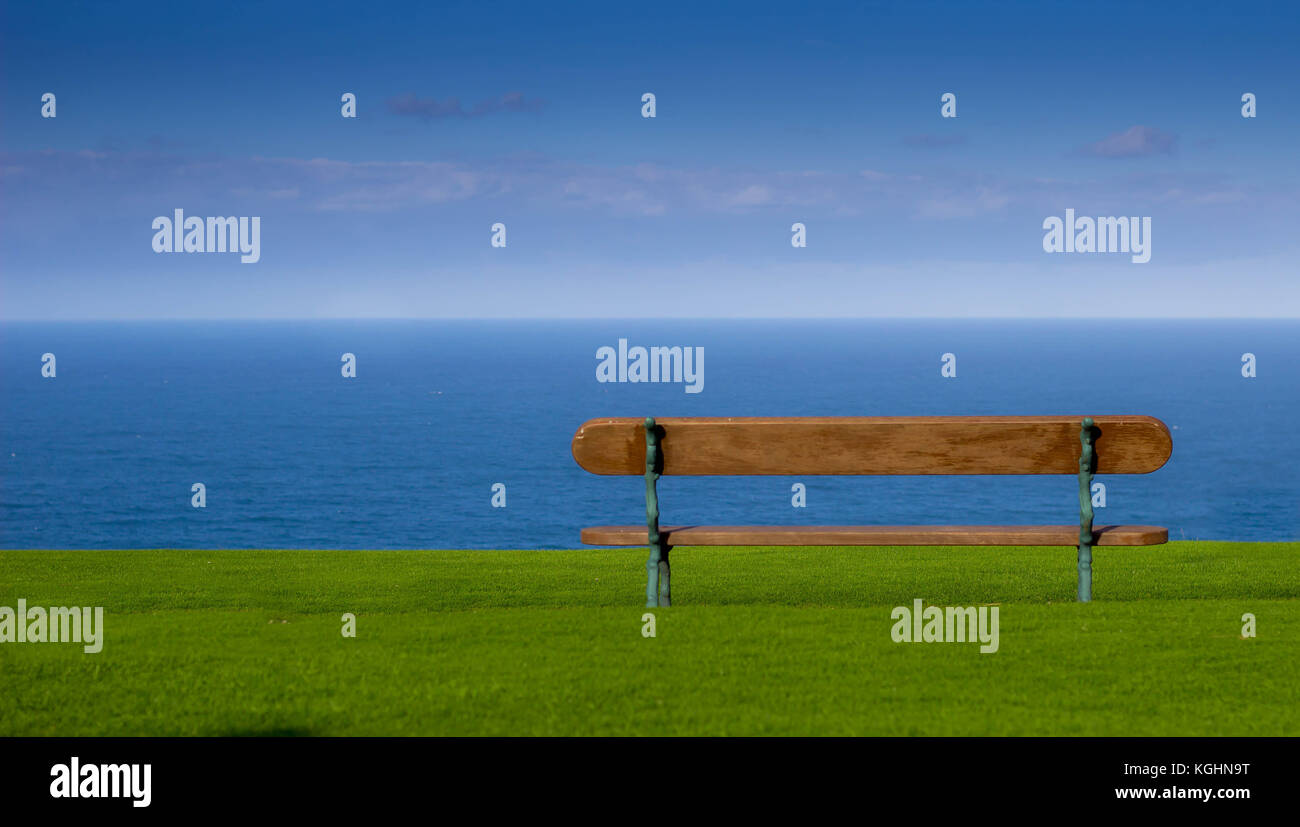 Bench overlooking the sea Stock Photo - Alamy
