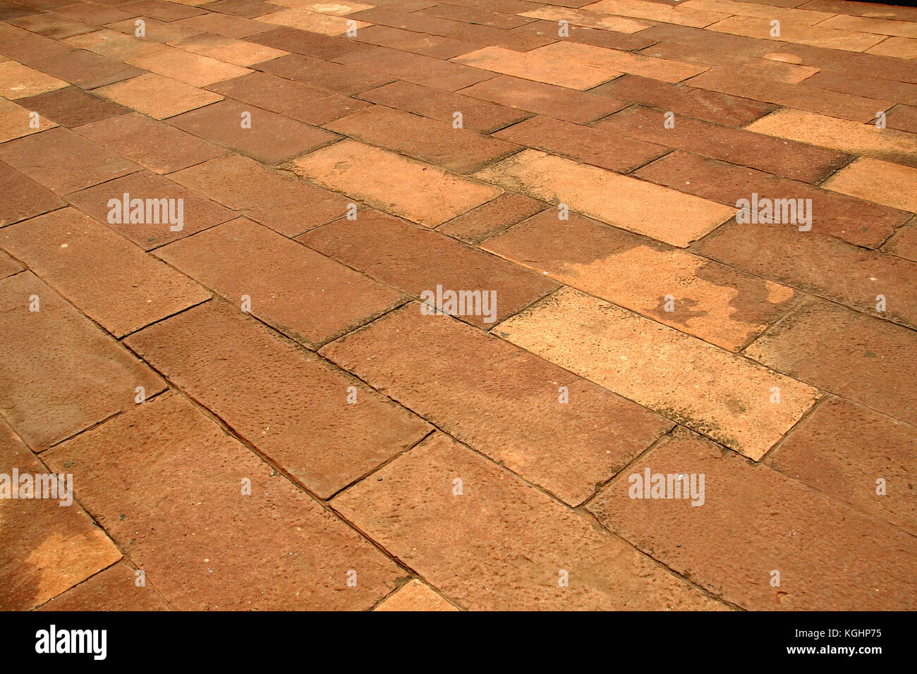 Flooring laid up with neatly dressed stone slabs Stock Photo - Alamy
