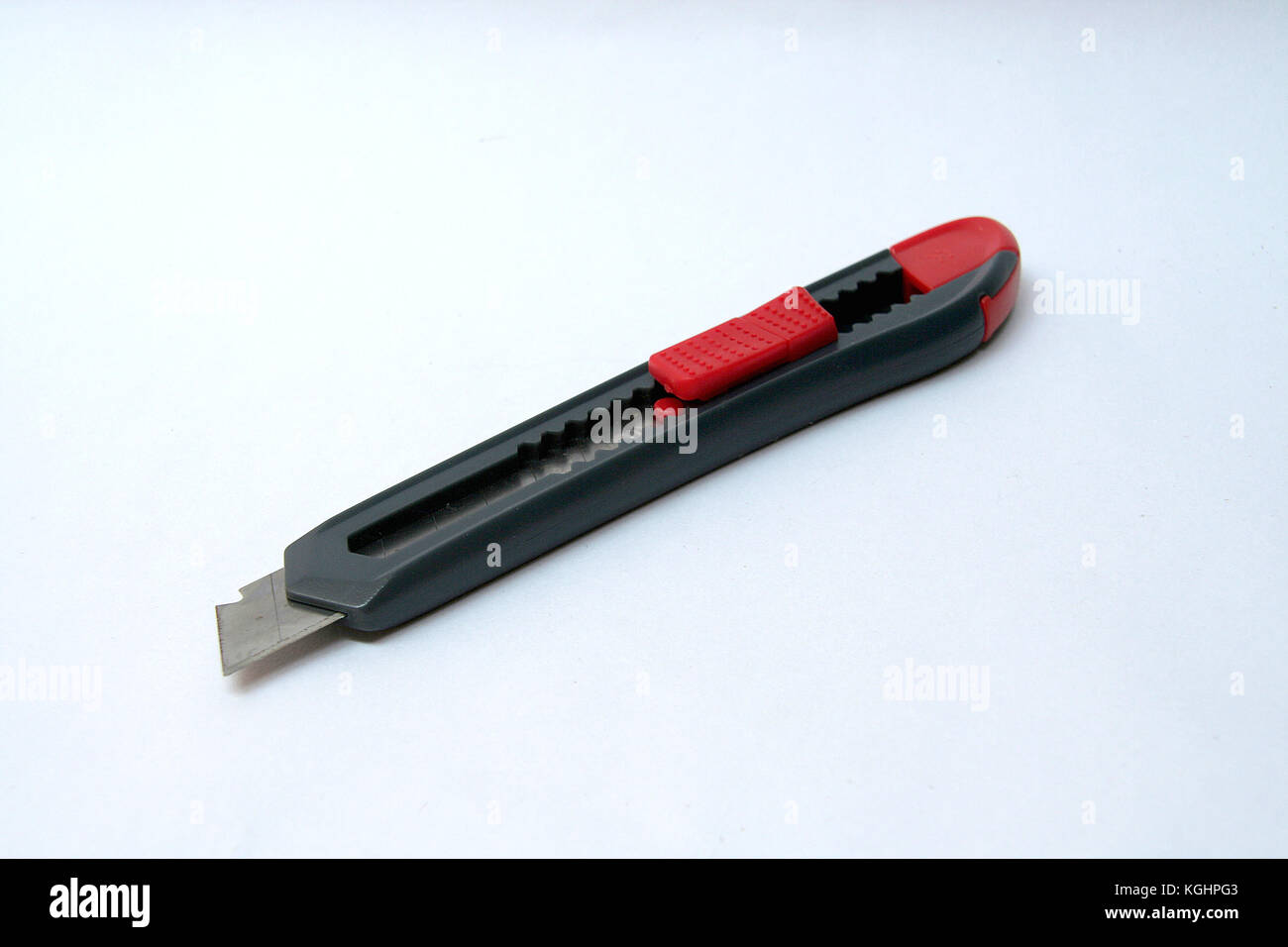 Pointed, sharp-edged paper trimmer used for art work isolated on white ...
