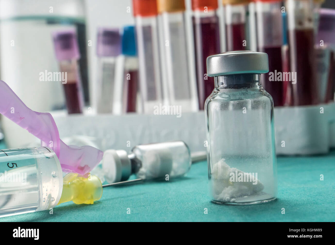 Several Vials And Syringe In Laboratory, Conceptual Image Stock Photo - Alamy