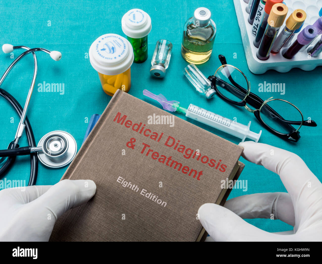 Doctor holds book of diagnosis and medical treatment, conceptual image ...