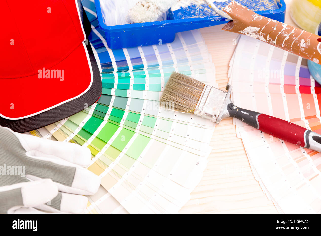 Color palette guide and painting supplies, paint brushes and color cans ...