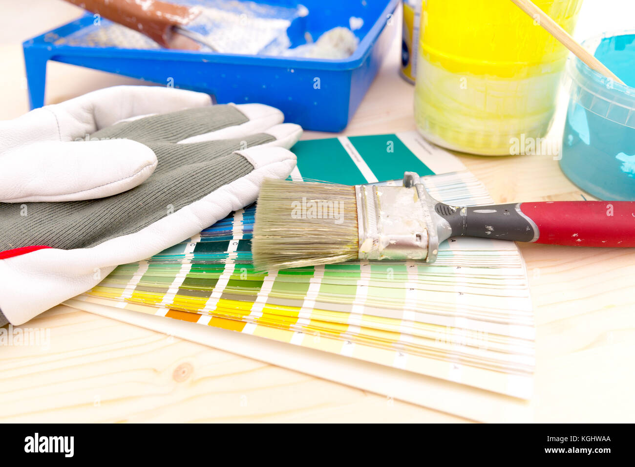 Color palette guide and painting supplies, paint brushes and color cans ...