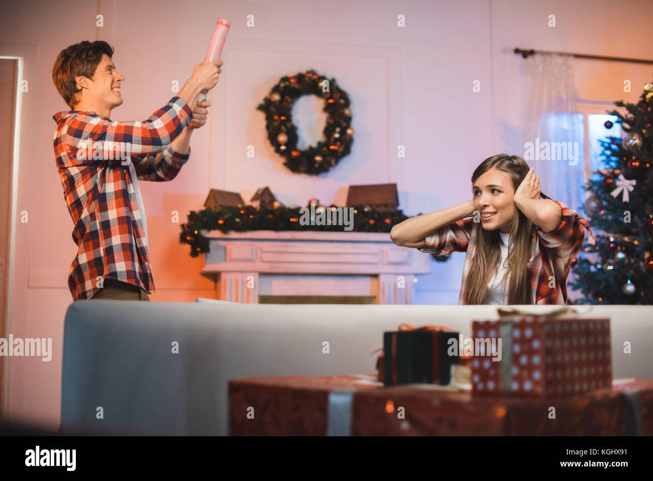 couple celebrating christmas together Stock Photo - Alamy