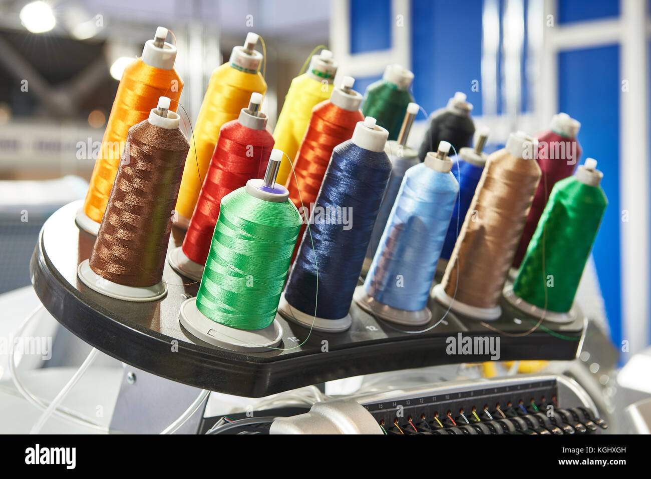 Bobbins with colored thread for industrial textile machines Stock Photo ...