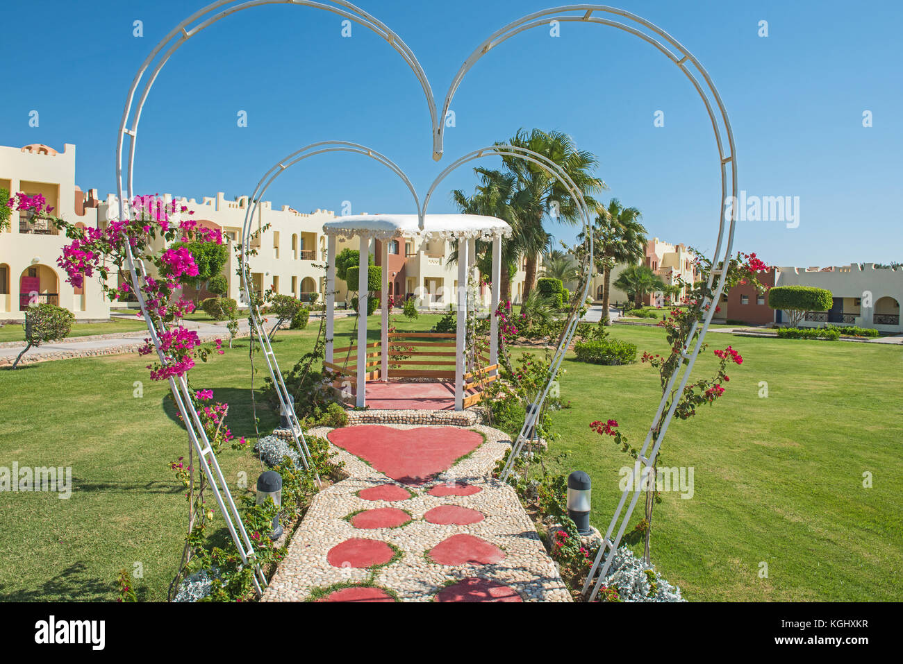 Formal landscaped gardens in grounds of a luxury tropical hotel resort ...