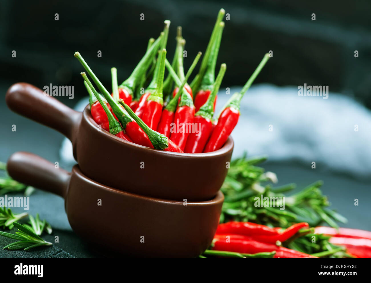 chilli peppers on the black table, chilli background Stock Photo - Alamy
