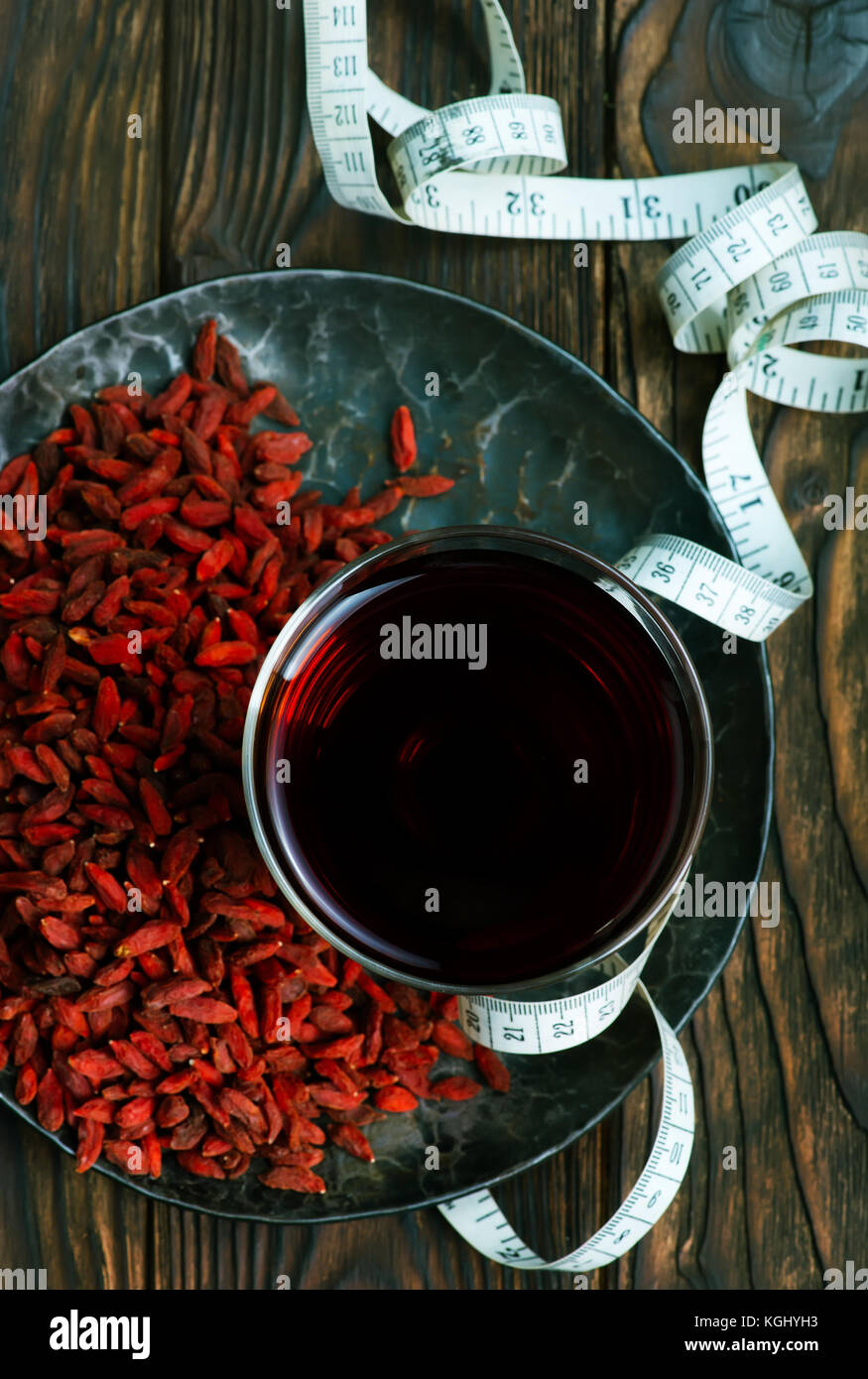 drink from goji and dry goji on a table Stock Photo - Alamy