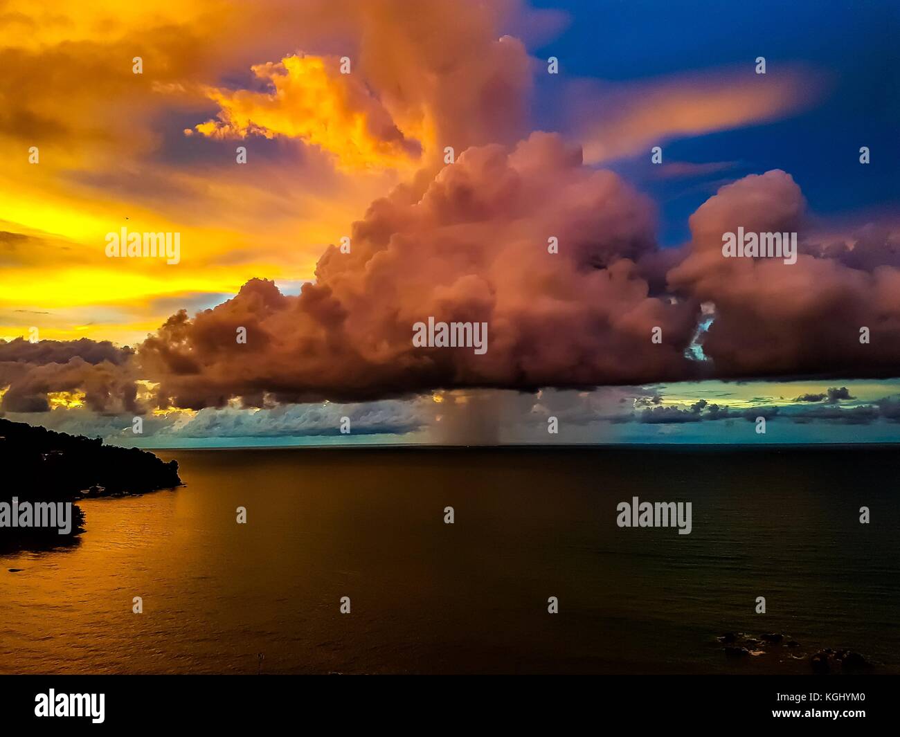 Golden sunset contrast with blue Stock Photo - Alamy