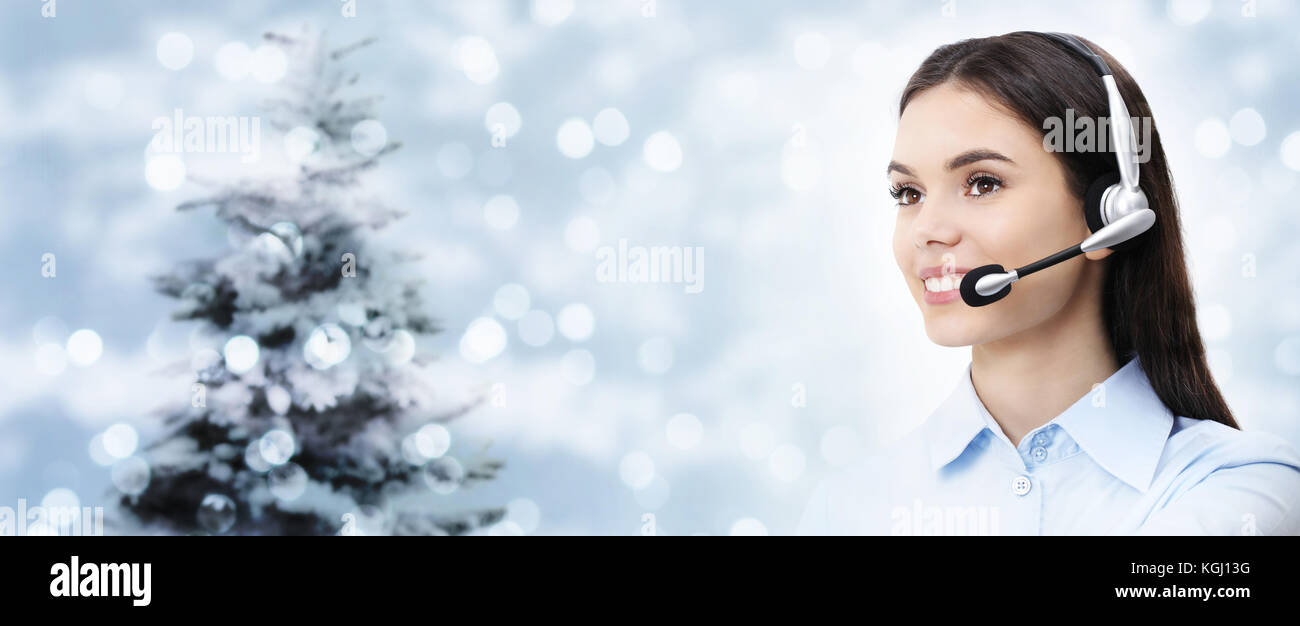 christmas theme woman with headset smiling isolated on christmas ...
