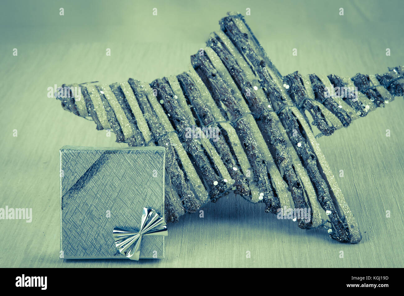 christmas silver star and silver present Stock Photo - Alamy