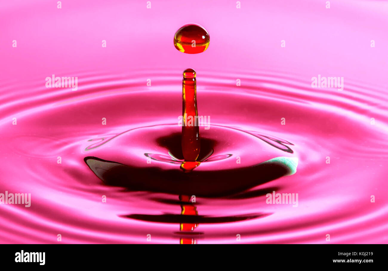 Waterdrop in water Stock Photo - Alamy