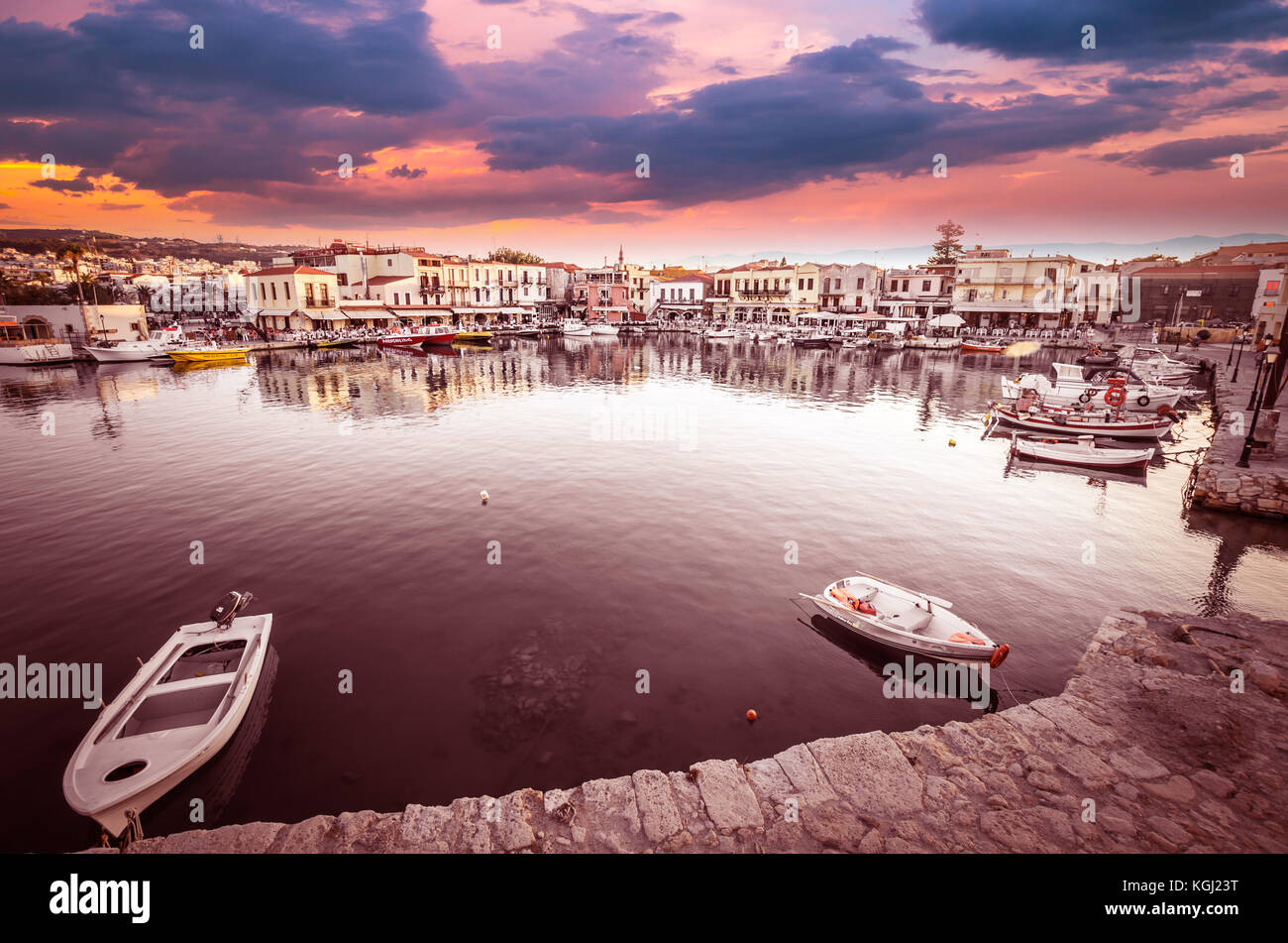 View of the old venetian port of Rethimno at sunset. Crete island ...