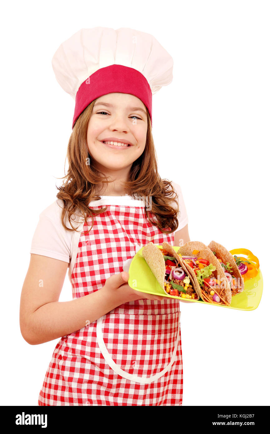 happy little girl cook with tacos fast food Stock Photo - Alamy