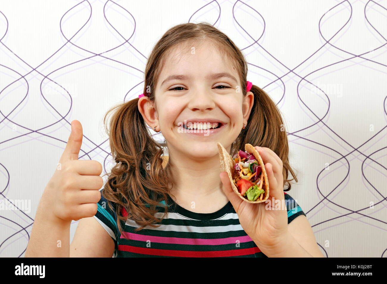 Female eating tacos hi-res stock photography and images - Alamy
