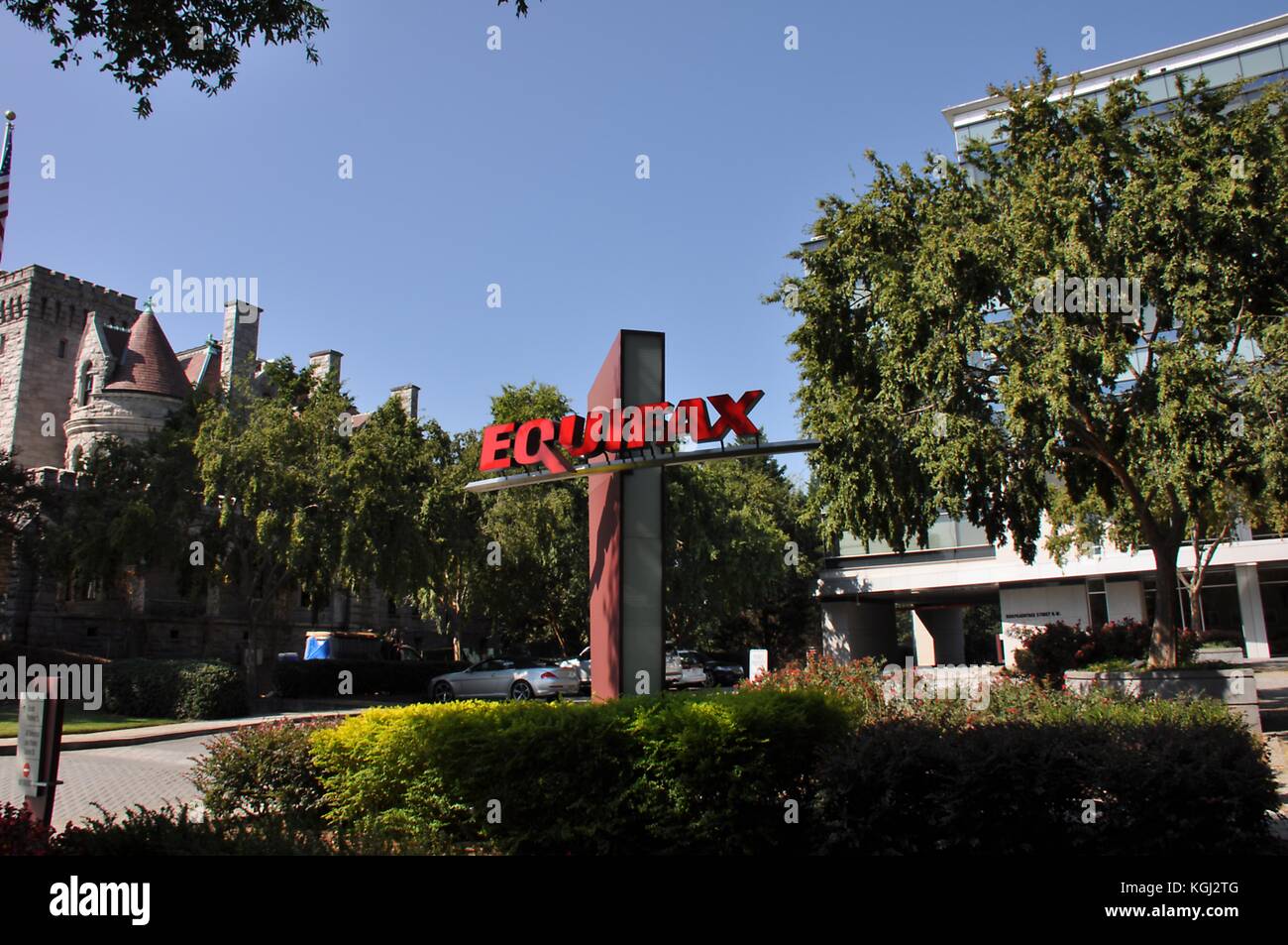 Sign with logo and a portion of the main building are visible at the ...