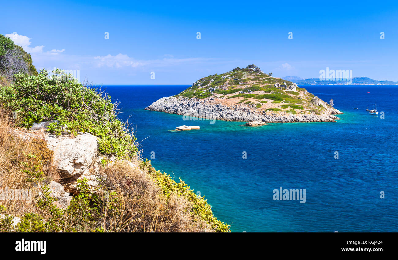 Vardiola St. Nicholas. Small island with ruins in the bay of Agios ...