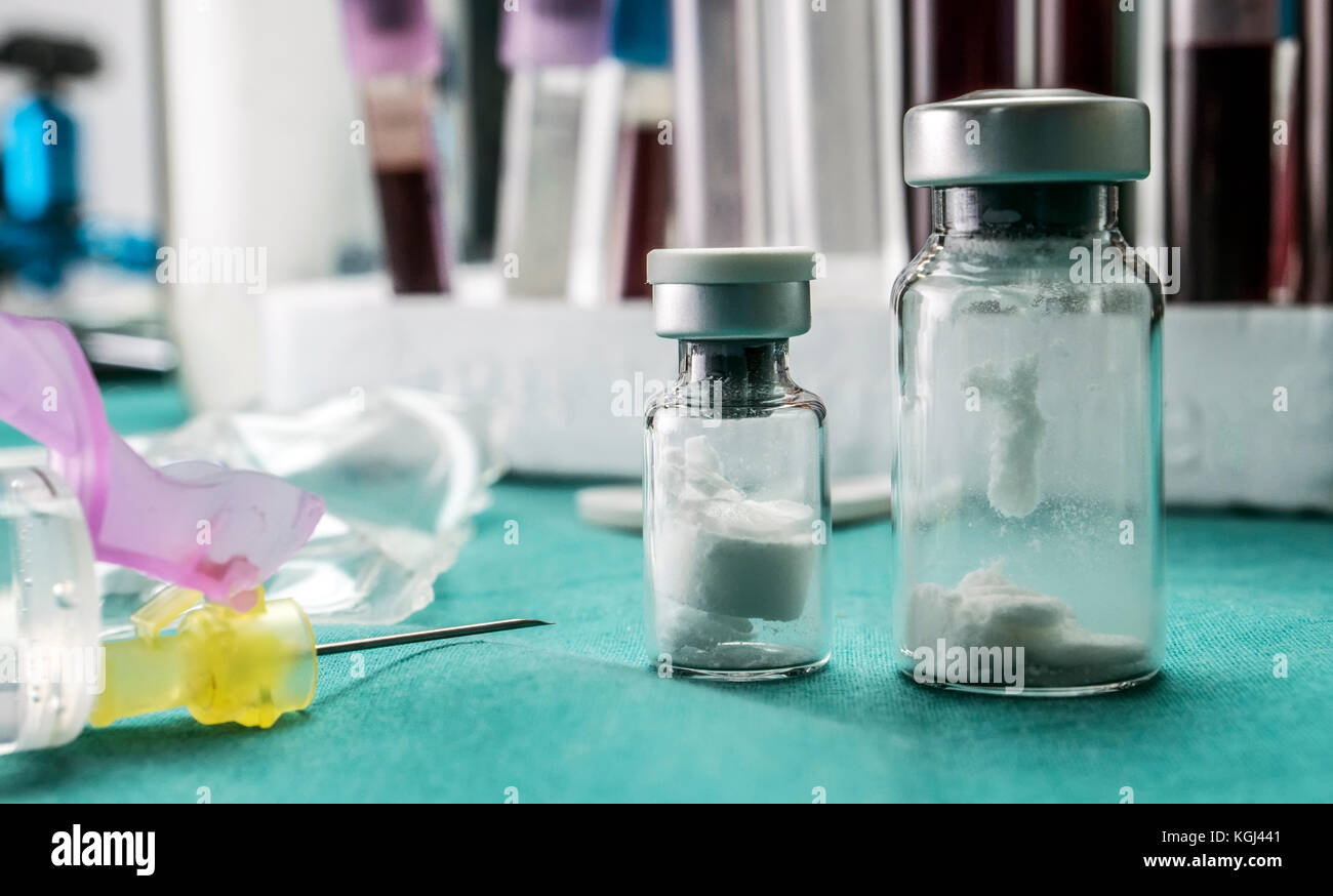 Several Vials And Syringe In Laboratory, Conceptual Image Stock Photo - Alamy