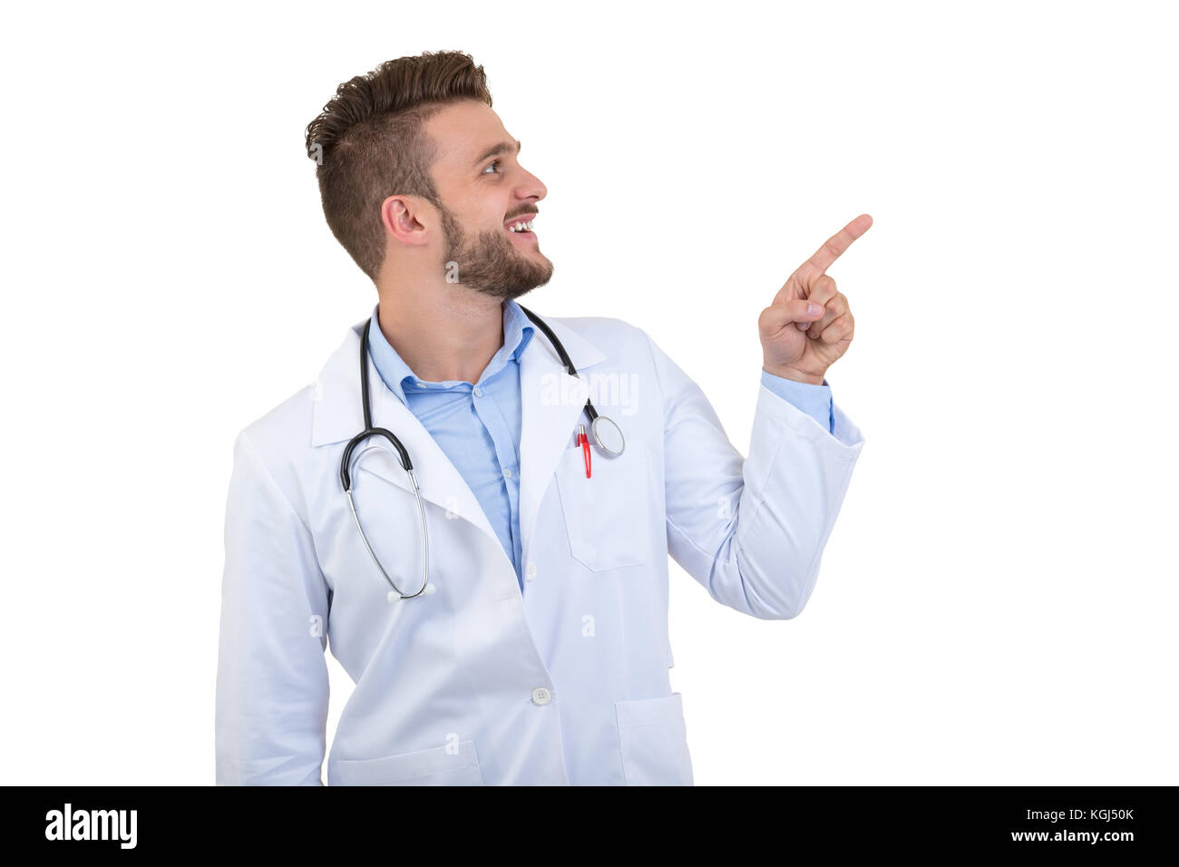 Portrait of a smiling male doctor pointing finger away isolated on a ...
