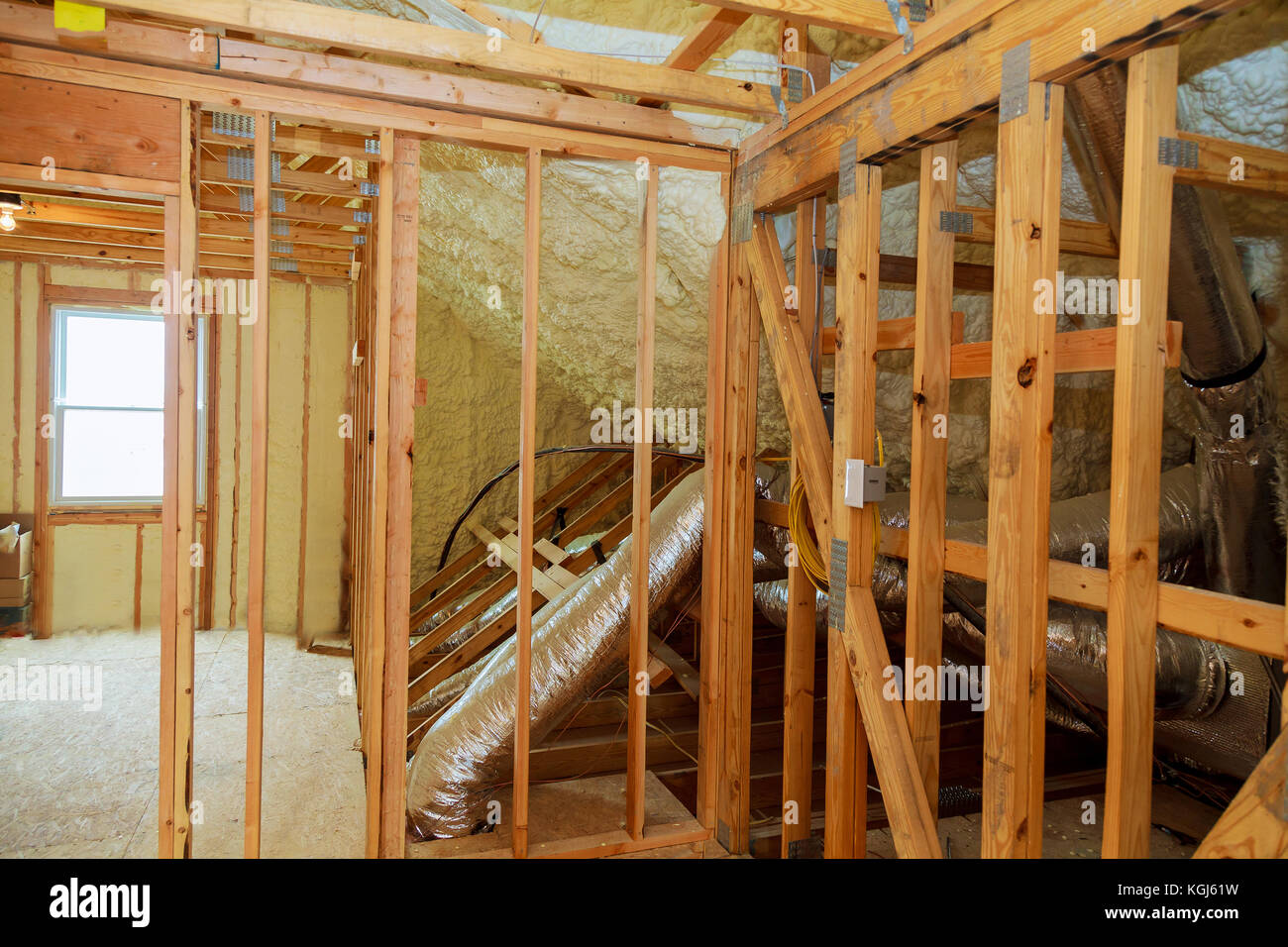 Foam plastic Insulation of a new home on a new roof Isolation in a new ...