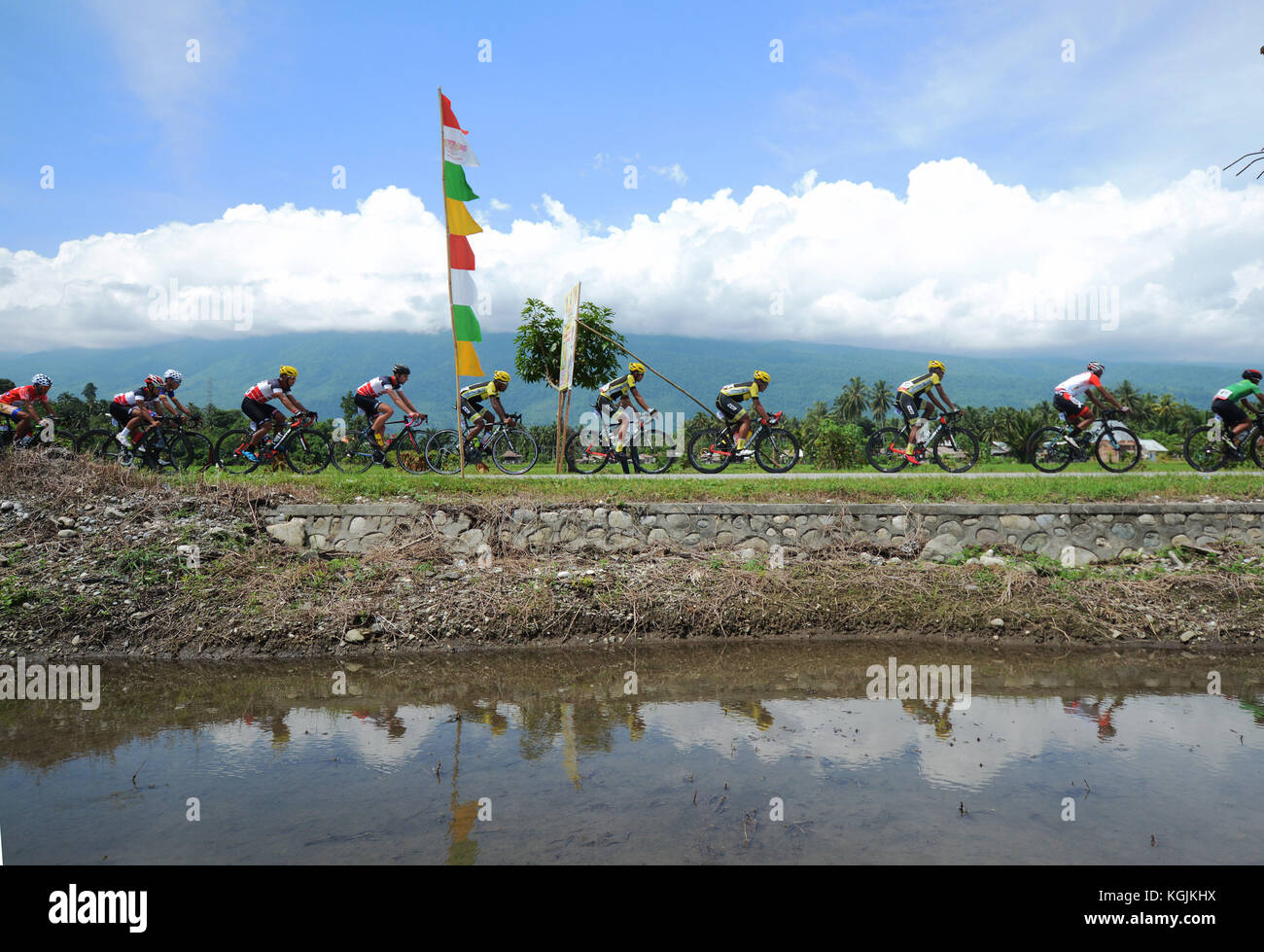 Drivers rode their bikes across the rice fields at Tour de Central ...