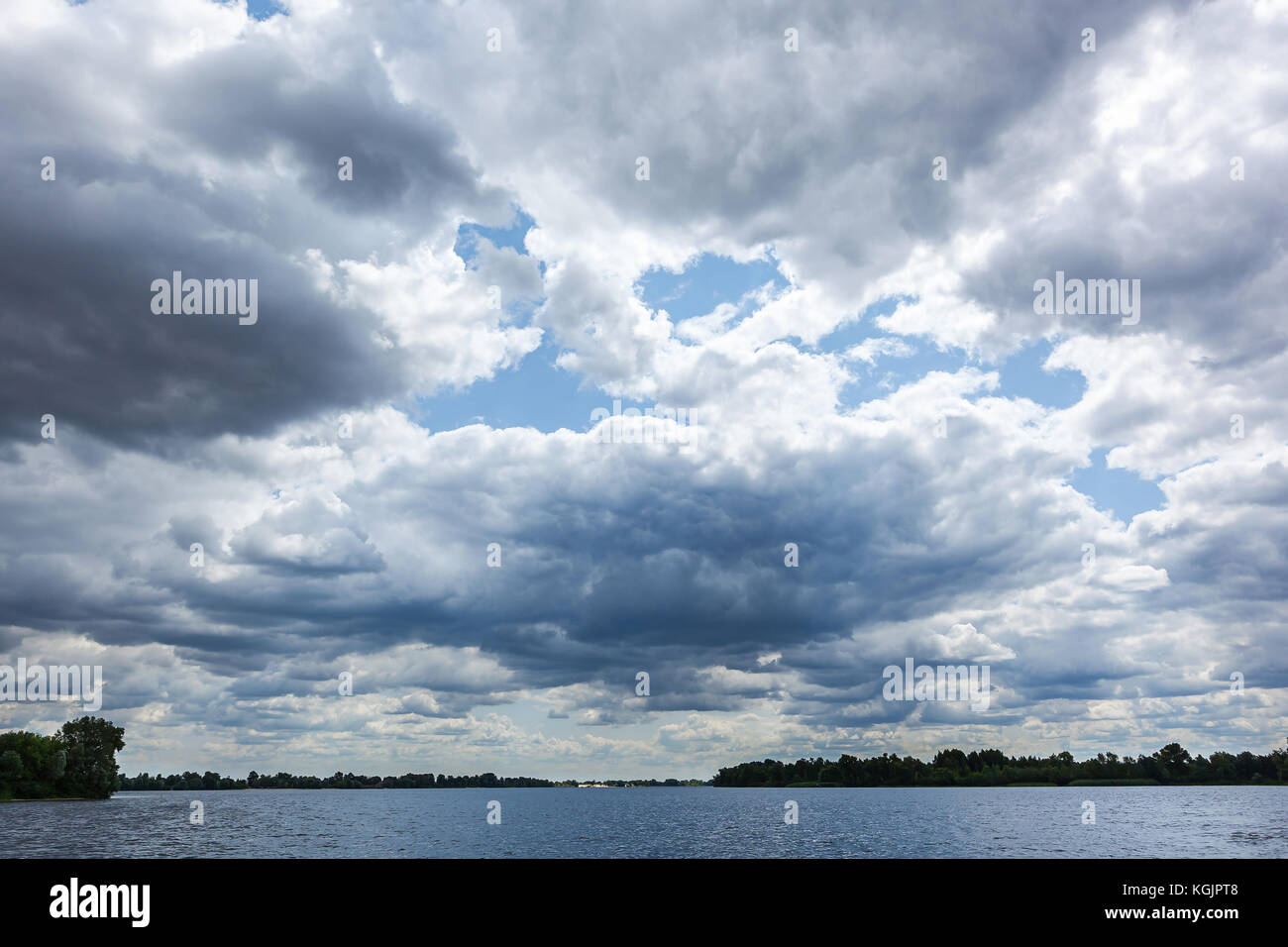 stormy clouds over the river, beautiful clouds over the water Stock ...