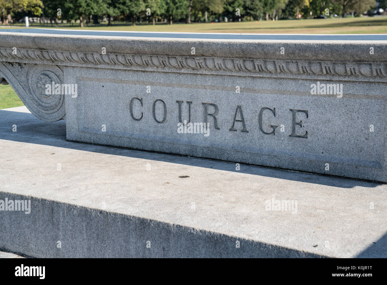 Courage Sign engraved in Stone Stock Photo - Alamy
