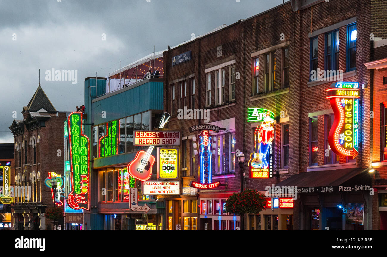 NASHVILLE, TN - OCT 8: Neon signs light the strip along Broadway on ...