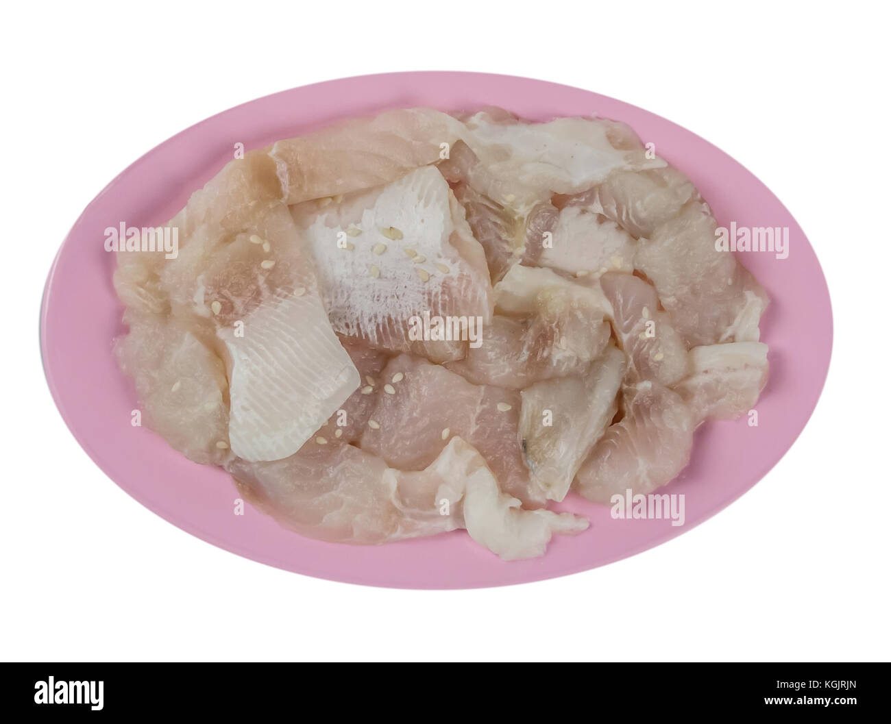 top view raw white fish with white sesame seed on plate isolated on ...