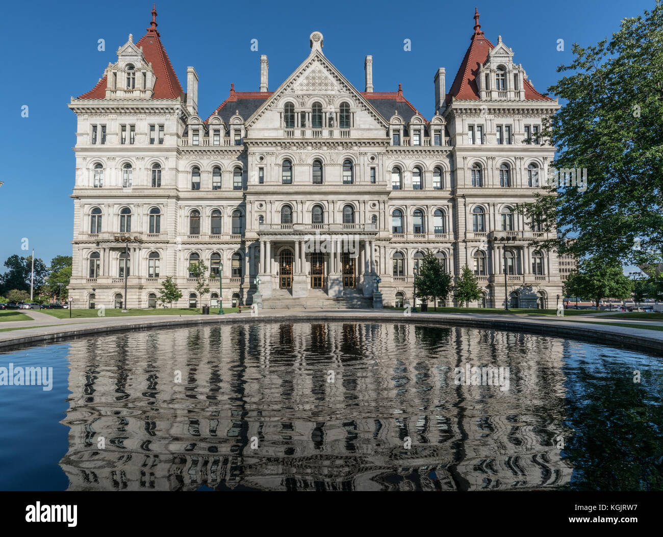 New York State Capitol Building reflection from East Capitol Park in ...