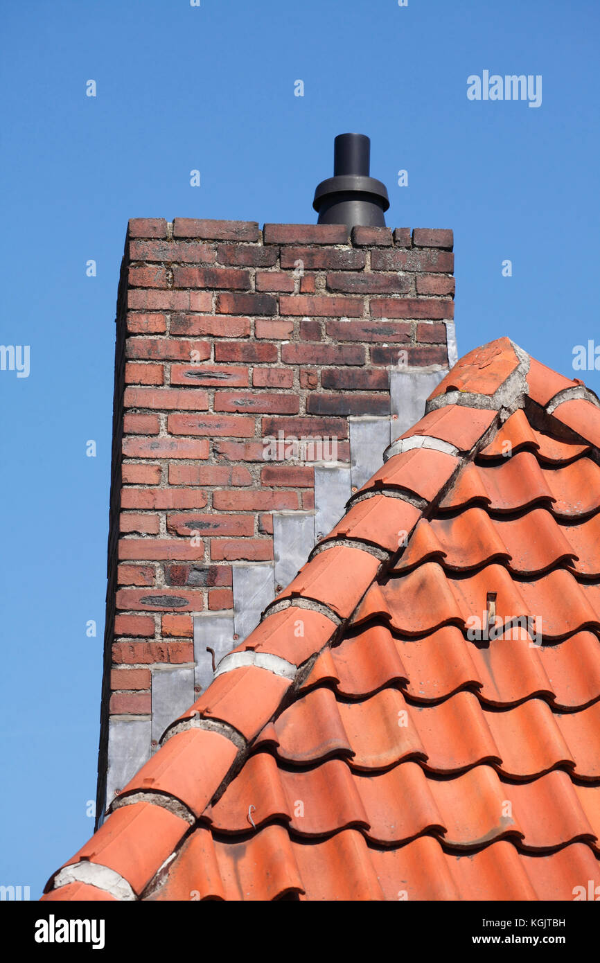 red roof, old chimney Stock Photo - Alamy