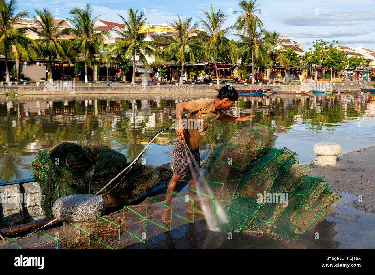 Cleaning a fishing boat hi-res stock photography and images - Alamy