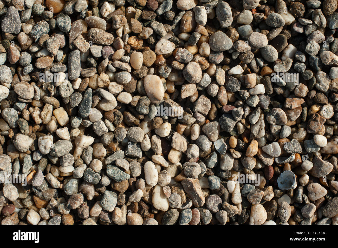 Small and big sand, gravel and pebbles background pattern. Full frame ...