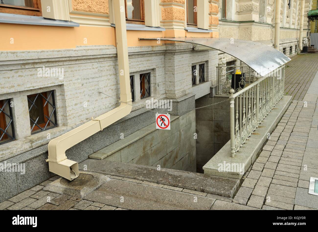 The entrance to the basement of the building closed.This is indicated ...