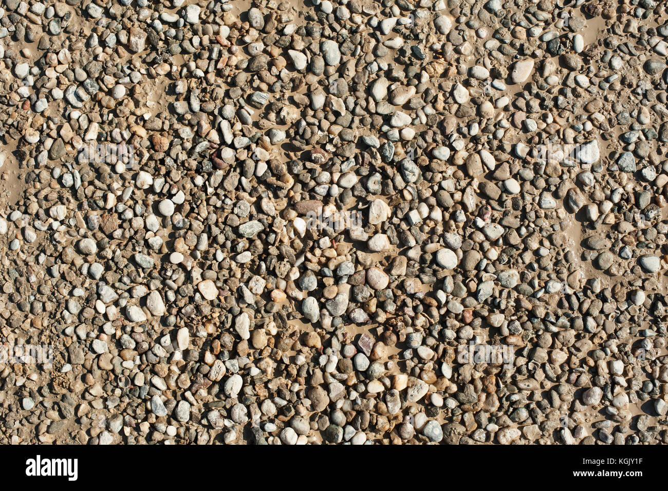 Small and big sand, gravel and pebbles background pattern. Full frame ...