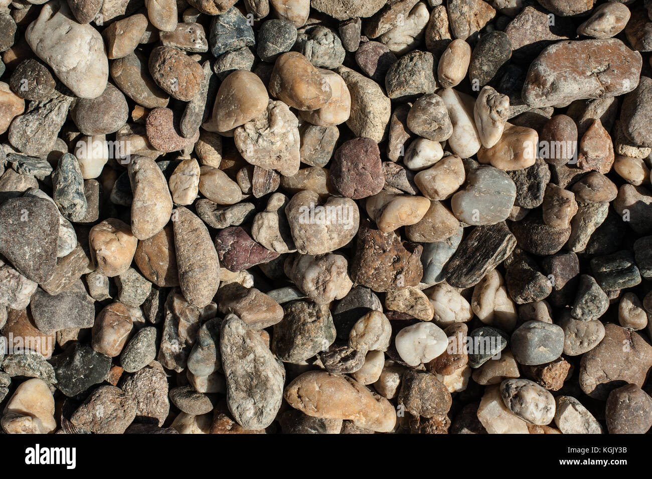 Small and big sand, gravel and pebbles background pattern. Full frame ...