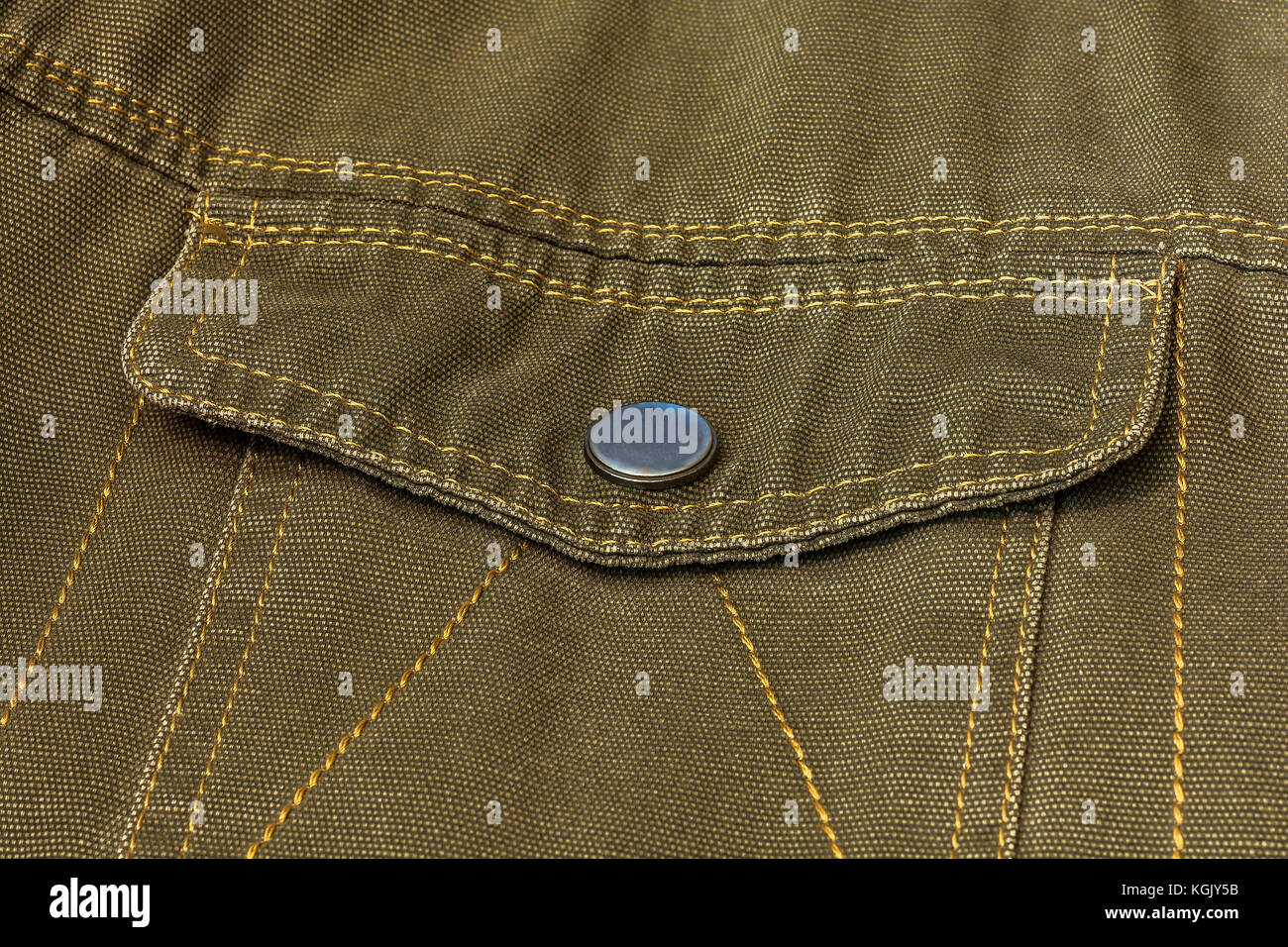 On the clothing is sewn a pocket valve with a button clasp Stock Photo ...