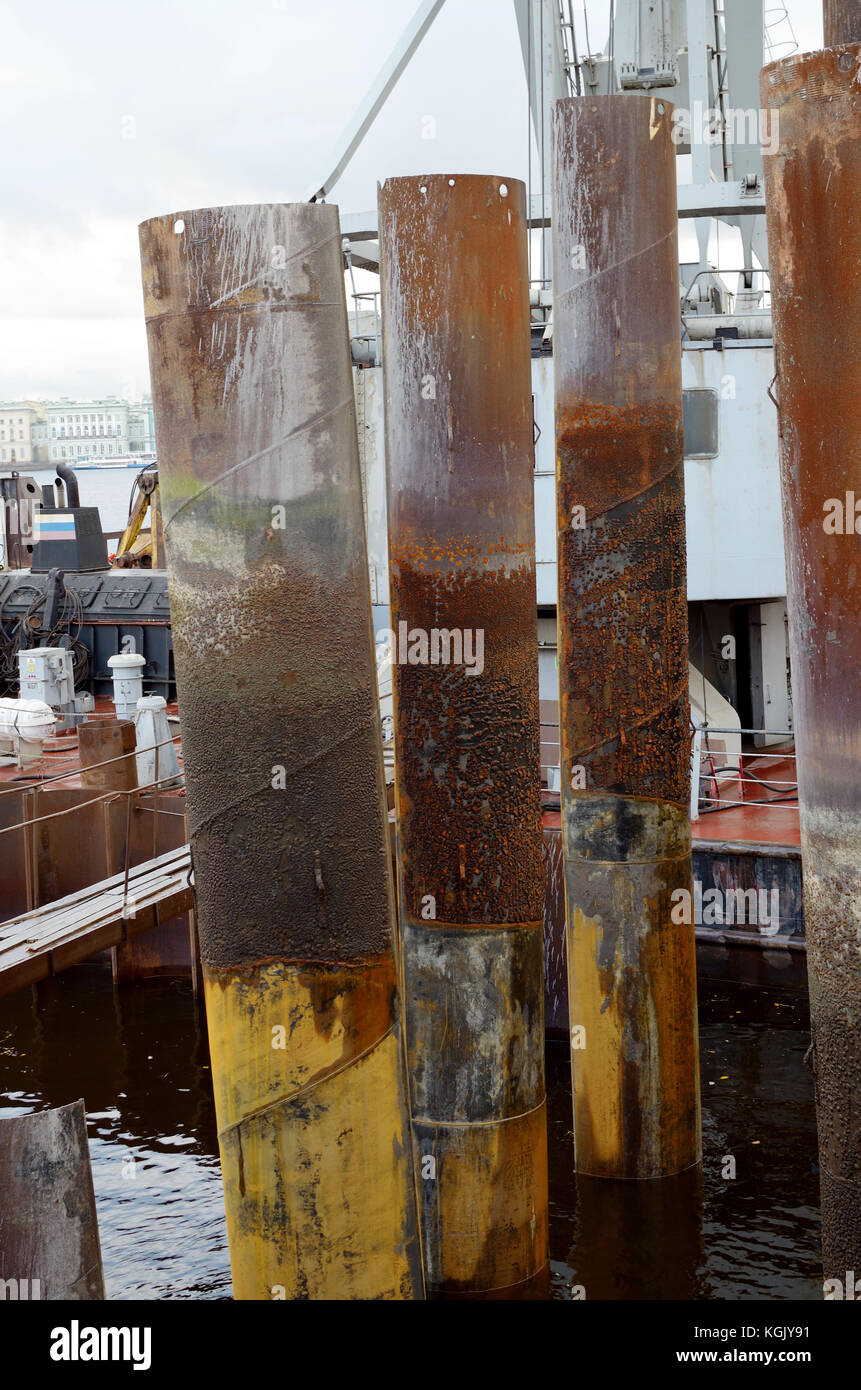 Iron pipes driven into the river bottom,for industrial work Stock Photo ...