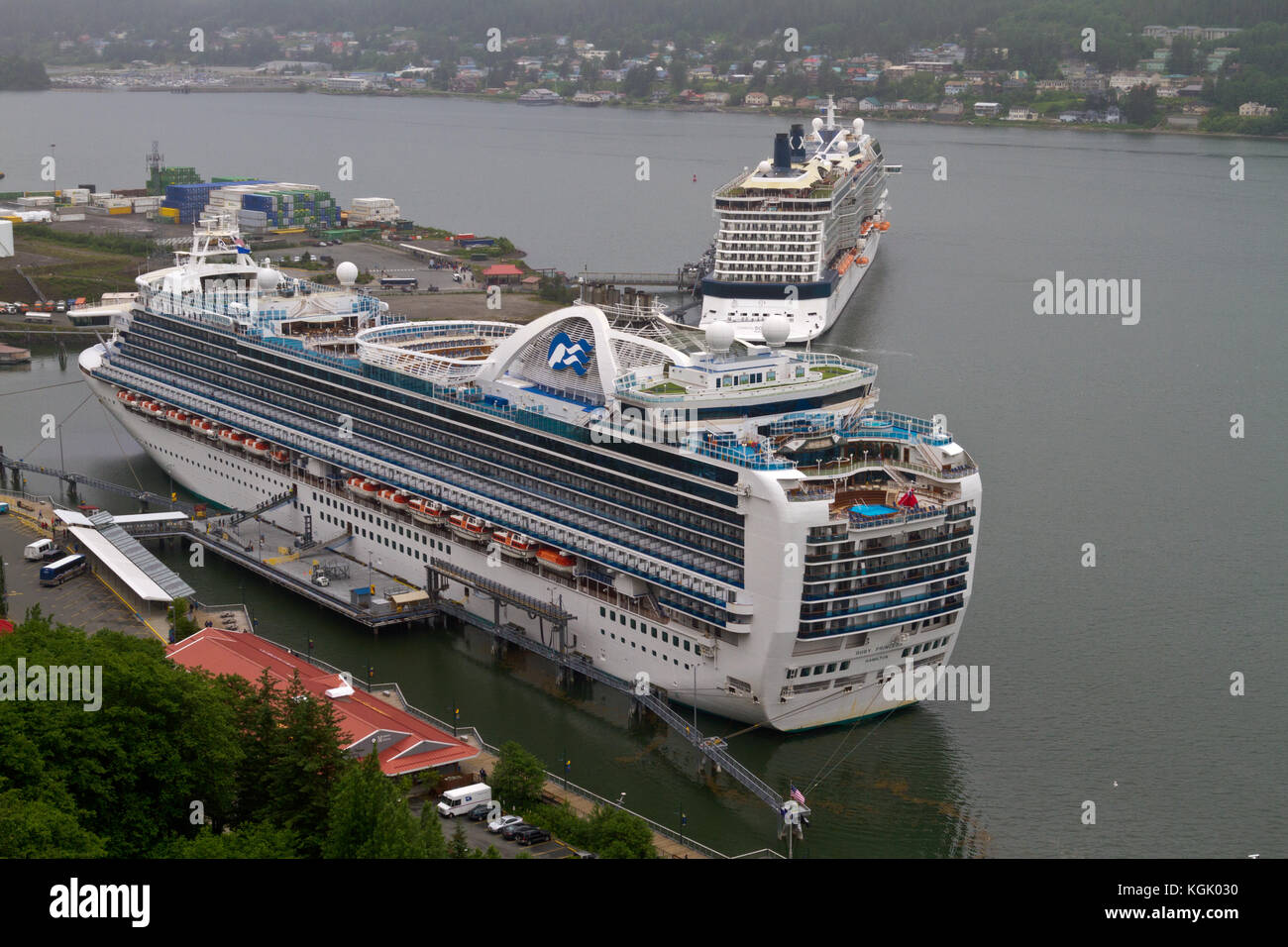 An elevated view of Juneau, Alaska harbor with cruise ships docked ...