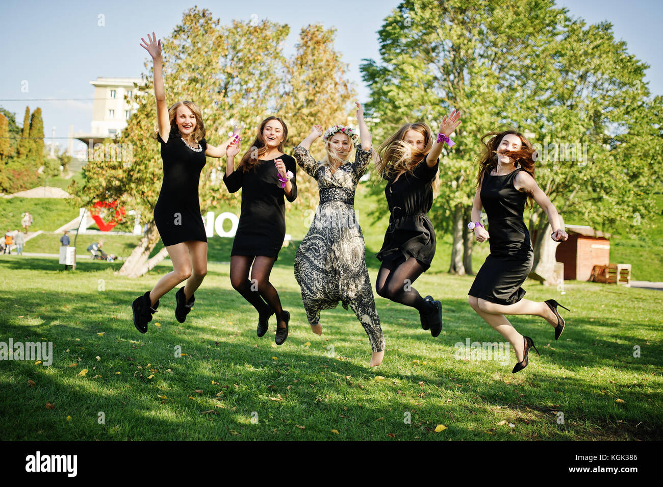 Five girls wear on black jumping at hen party Stock Photo - Alamy