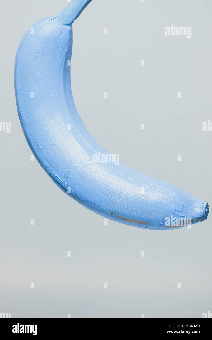 Blue banana on white background Stock Photo - Alamy