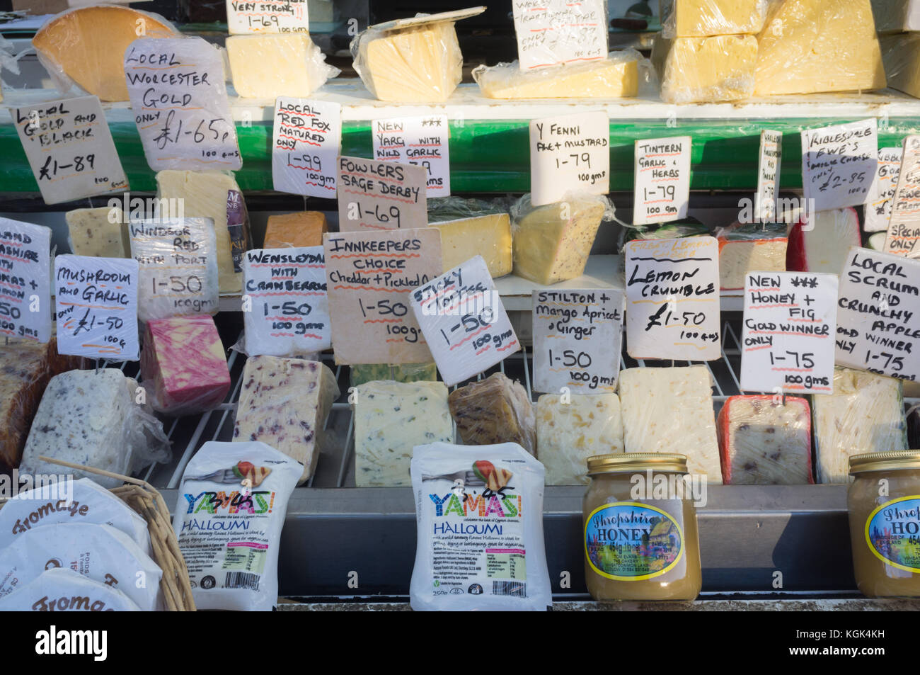 Display of cheeses in a shop counter, UK Stock Photo - Alamy