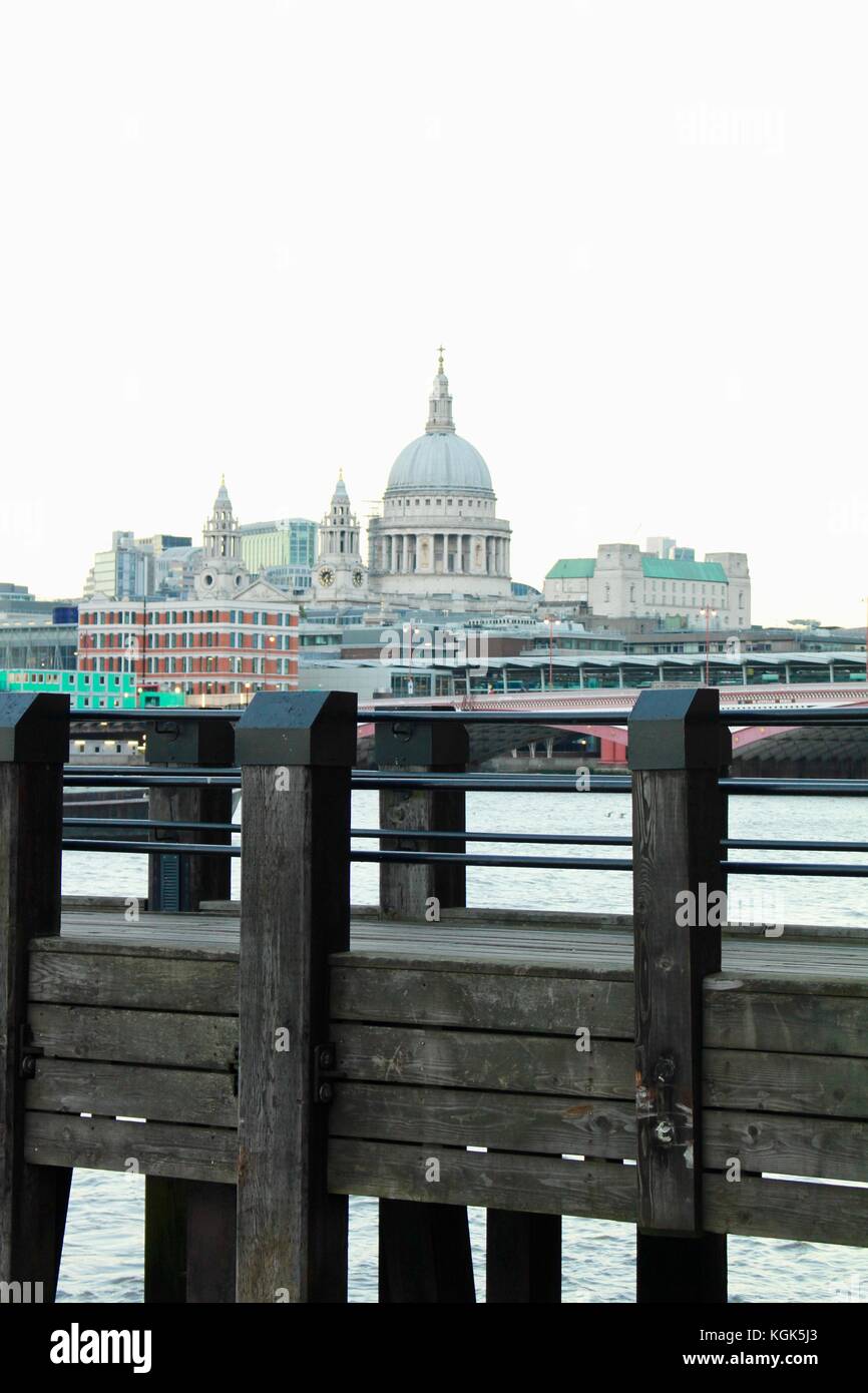 View over Thames at dusk through jetty from Southbank to St Pauls with ...